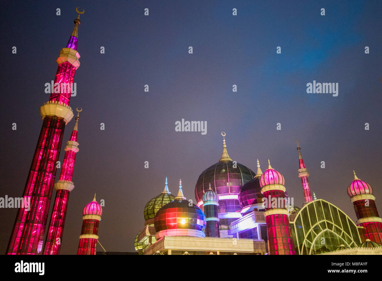 Colourful views of the Masjid Kristal (Crystal Mosque) at night, Kuala ...