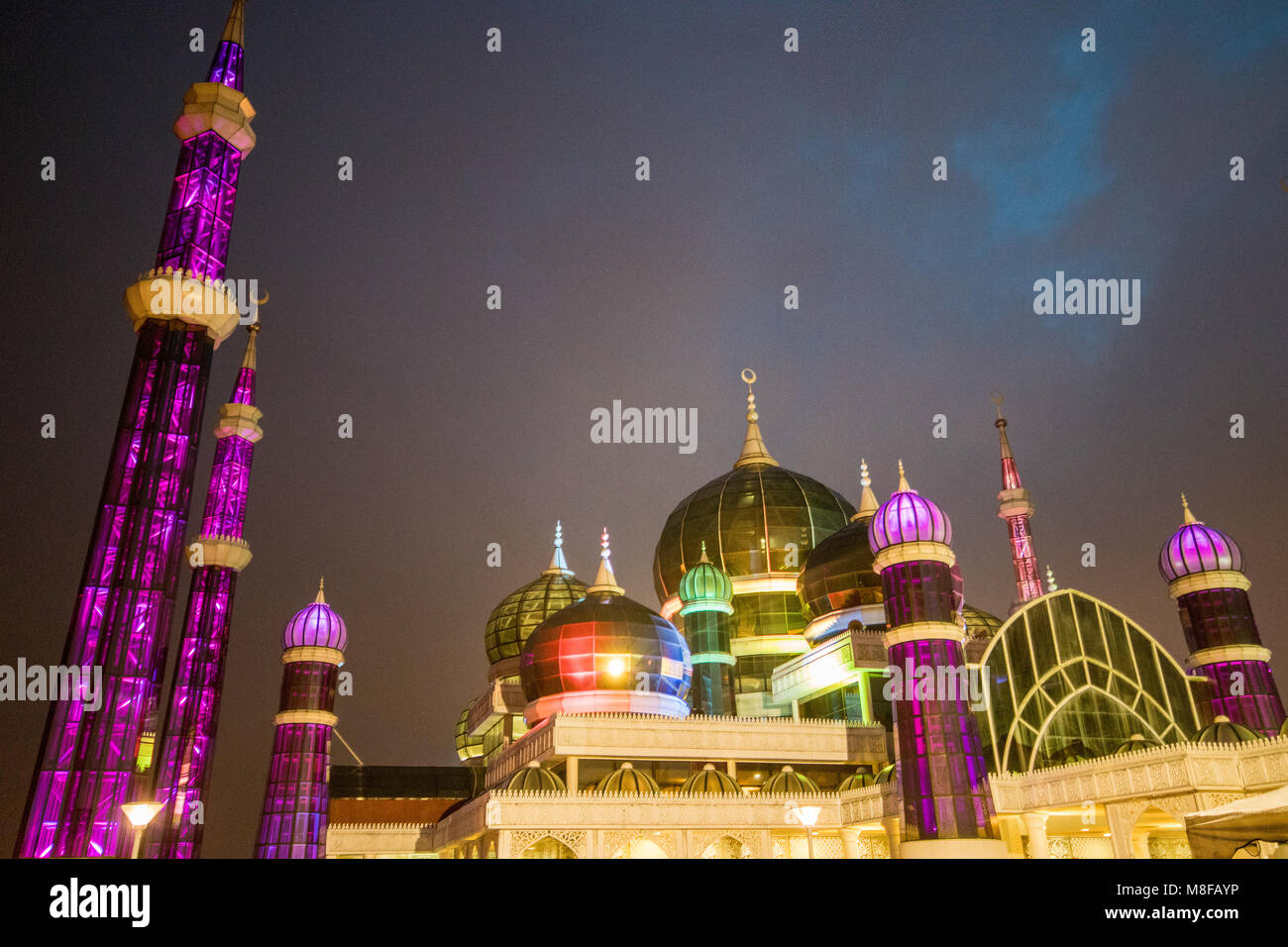 Colourful views of the Masjid Kristal (Crystal Mosque) at night, Kuala ...