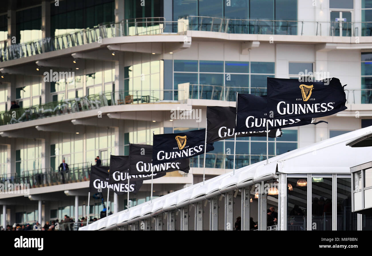 Guinness flags fly in the wind during Ladies Day of the 2018 Cheltenham ...