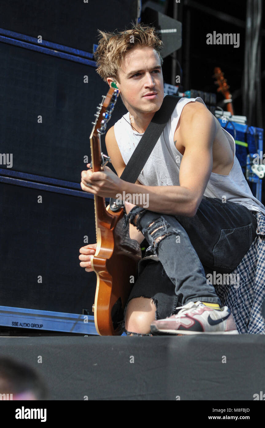 Celebrity pop star performing guitar music singing hi-res stock ...