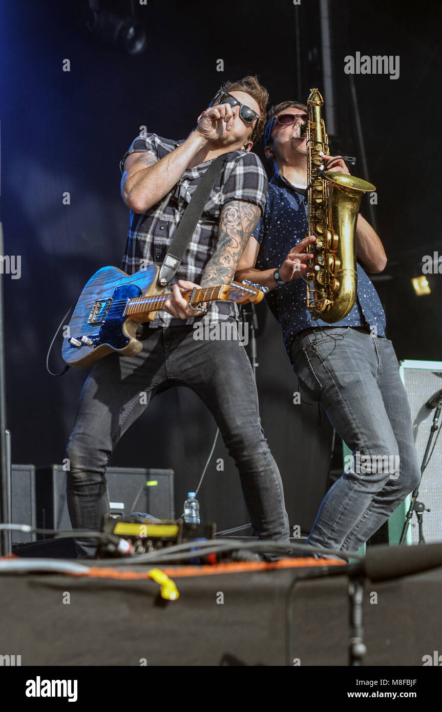 Pop stars perform at a music festival in the summer in the UK Stock ...