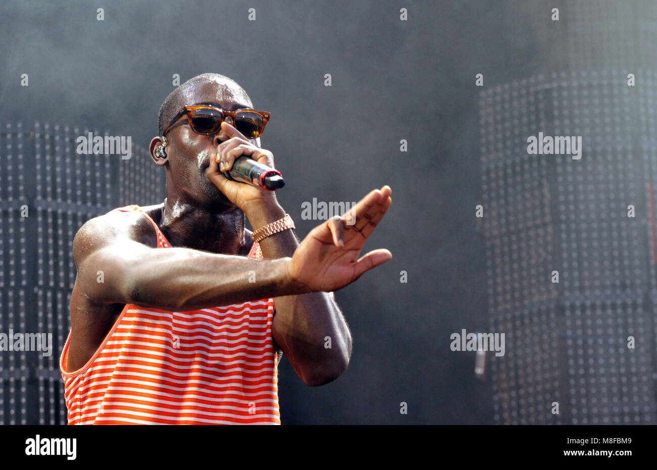 Pop stars perform at a music festival in the summer in the UK Stock ...