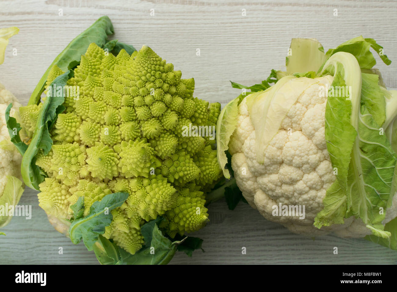 bio big Romanesco broccoli, or Roman cauliflower with white cauliflower ...