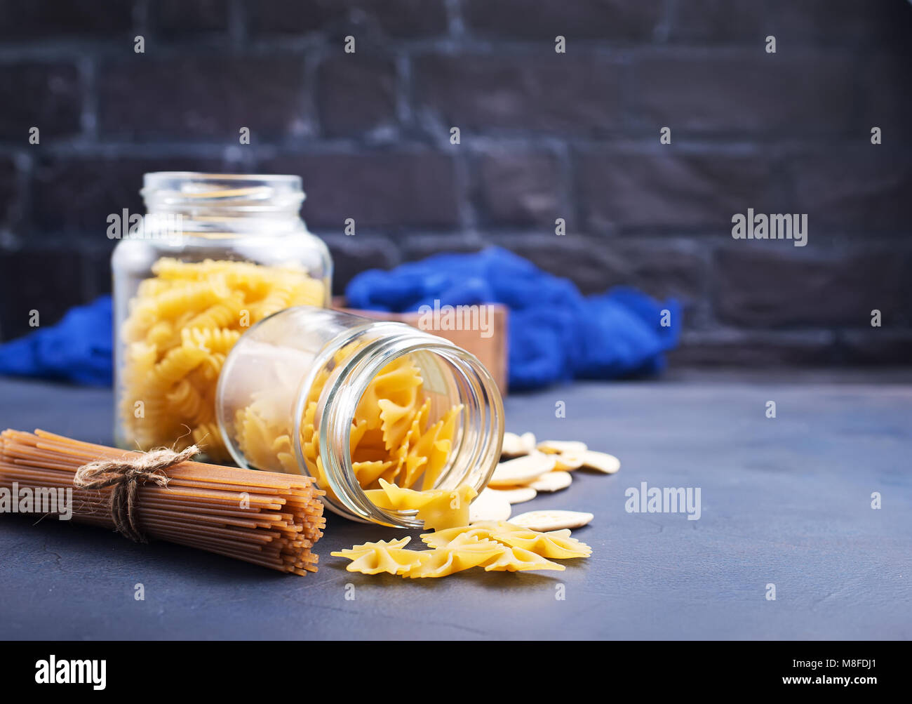 different kind of pasta, raw pasta on a table Stock Photo - Alamy