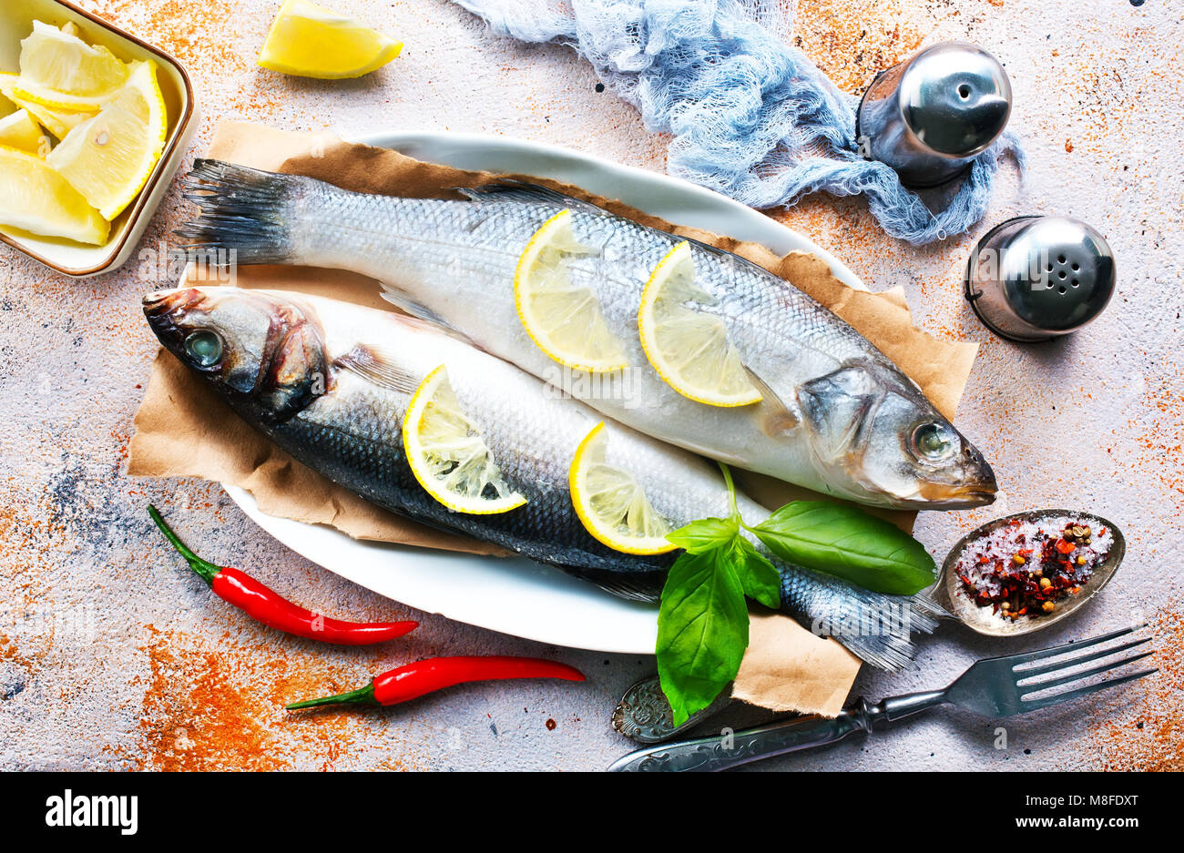 raw fish with spice and salt, fish with lemon and aroma herb Stock ...