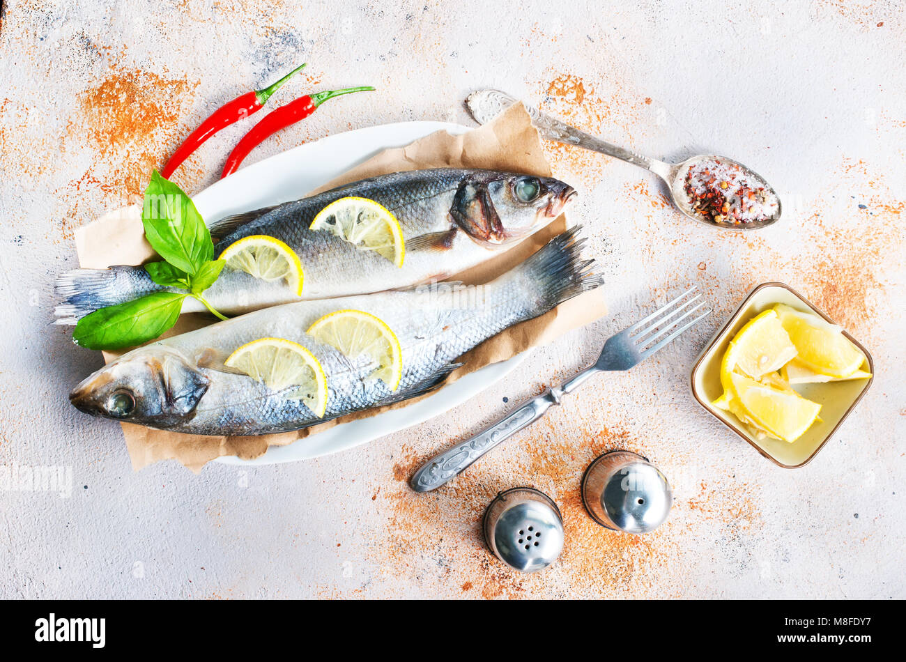 raw fish with spice and salt, fish with lemon and aroma herb Stock ...