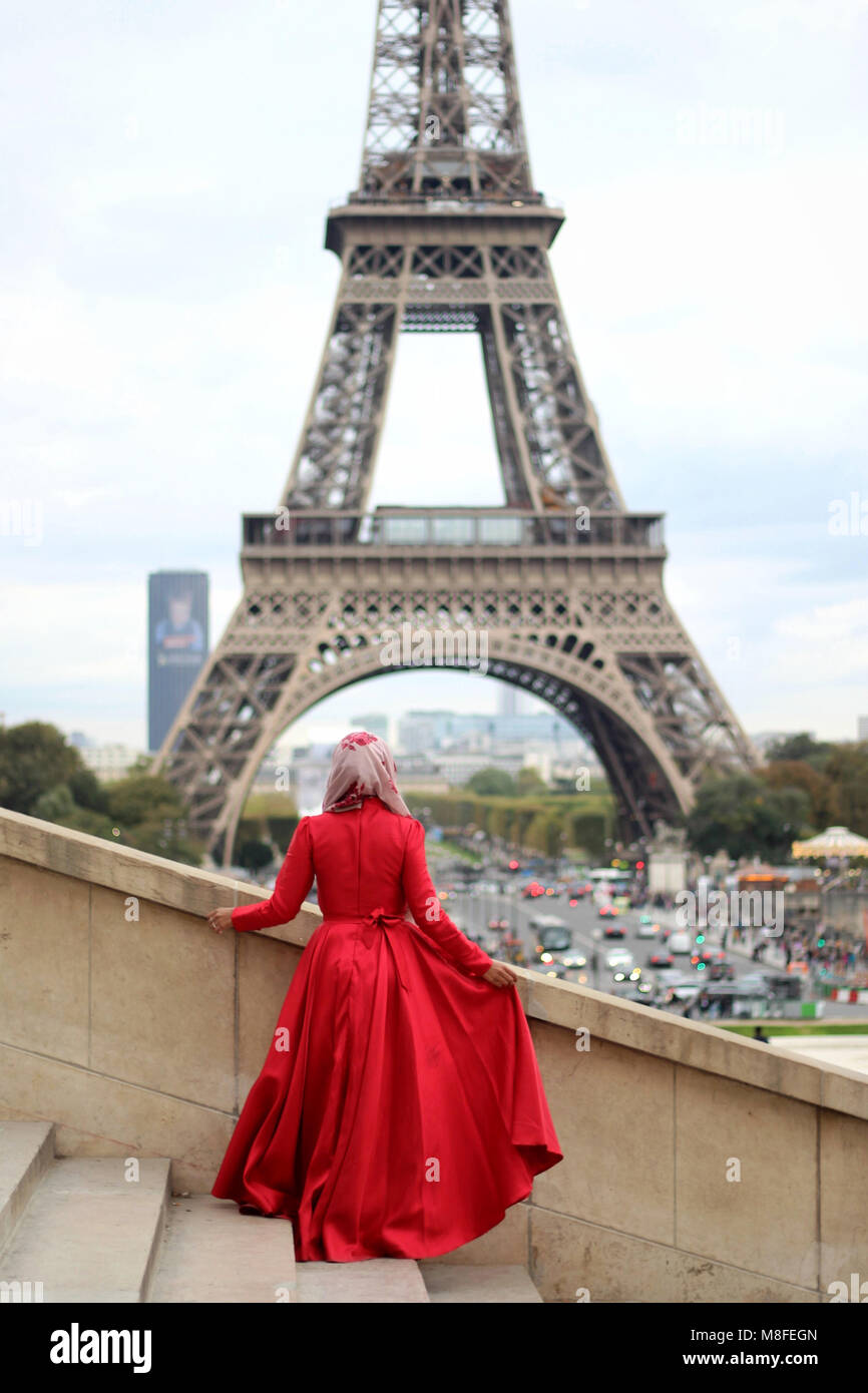 Red Lady in Paris Stock Photo - Alamy