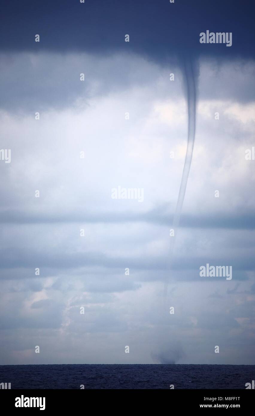 Tornado and storm clouds in the Indian Ocean Stock Photo - Alamy