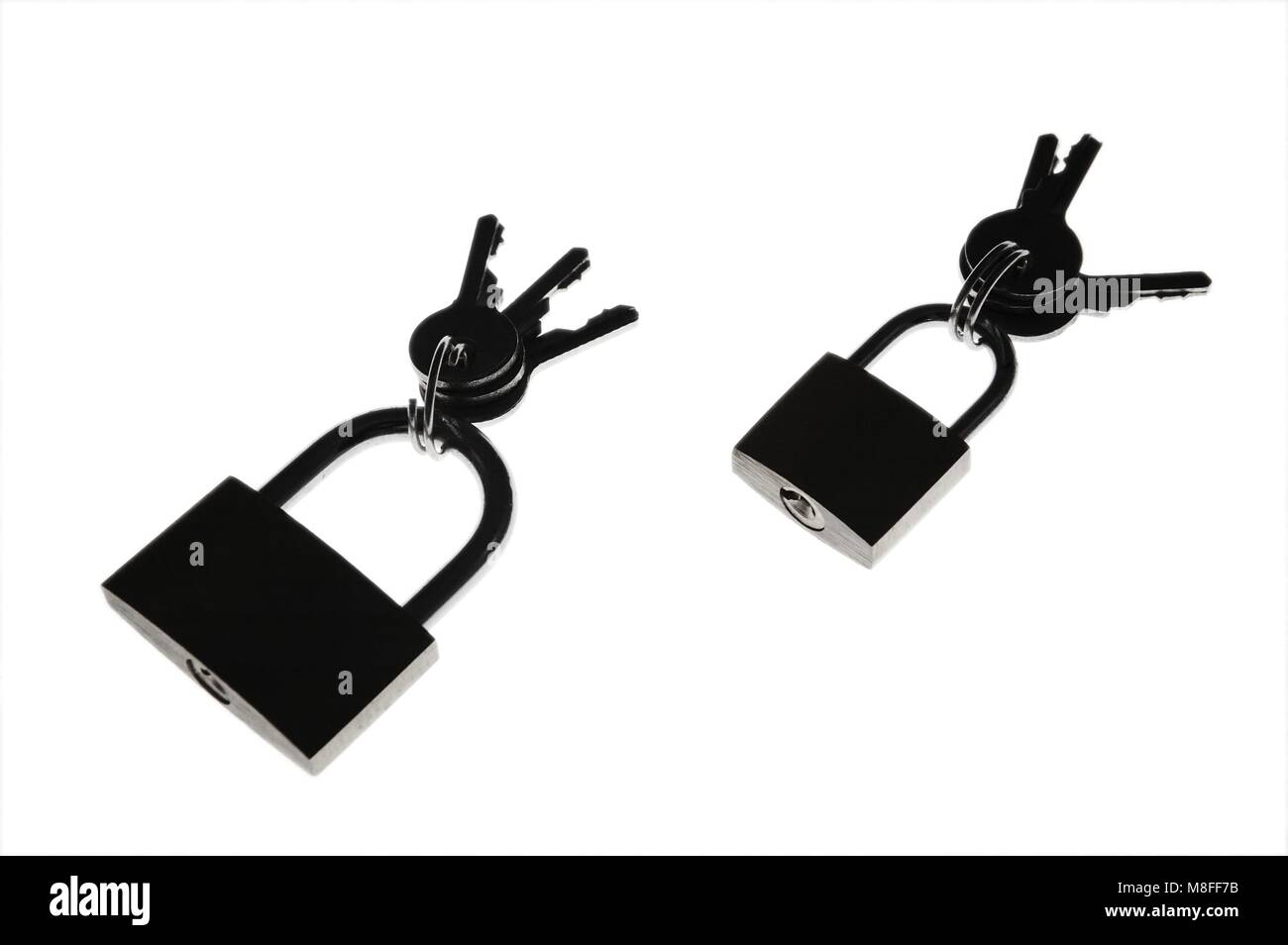 Two locks Cut Out Stock Images & Pictures - Alamy