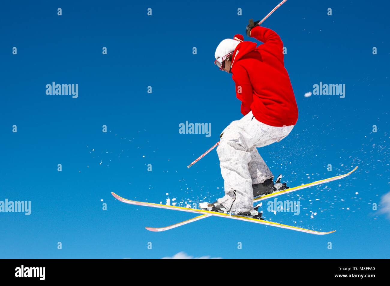 Skier and a blue sky Stock Photo - Alamy