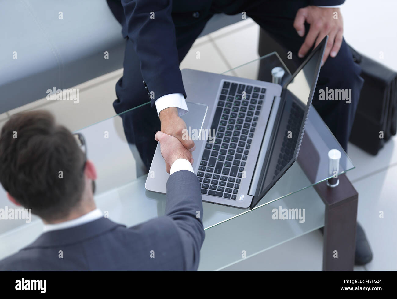 handshake business people in the workplace Stock Photo - Alamy