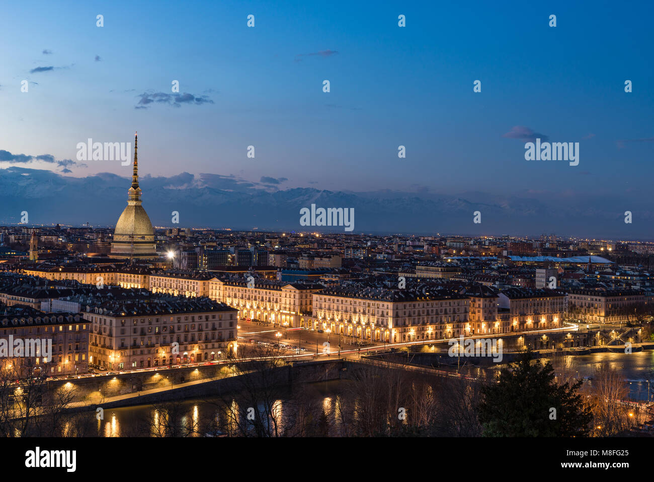 Turin skyline at dusk, Torino, Italy, panorama cityscape with the Mole ...