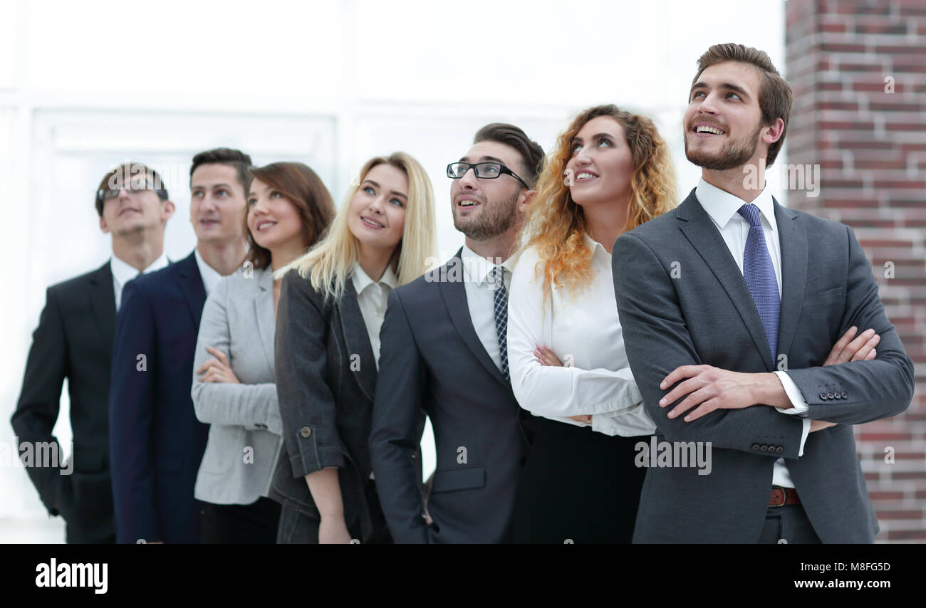 successful business team looking at copy space Stock Photo - Alamy