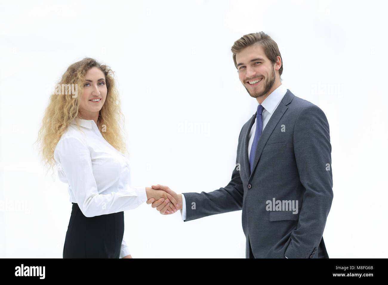 handshake Manager and client on blurred background Stock Photo - Alamy