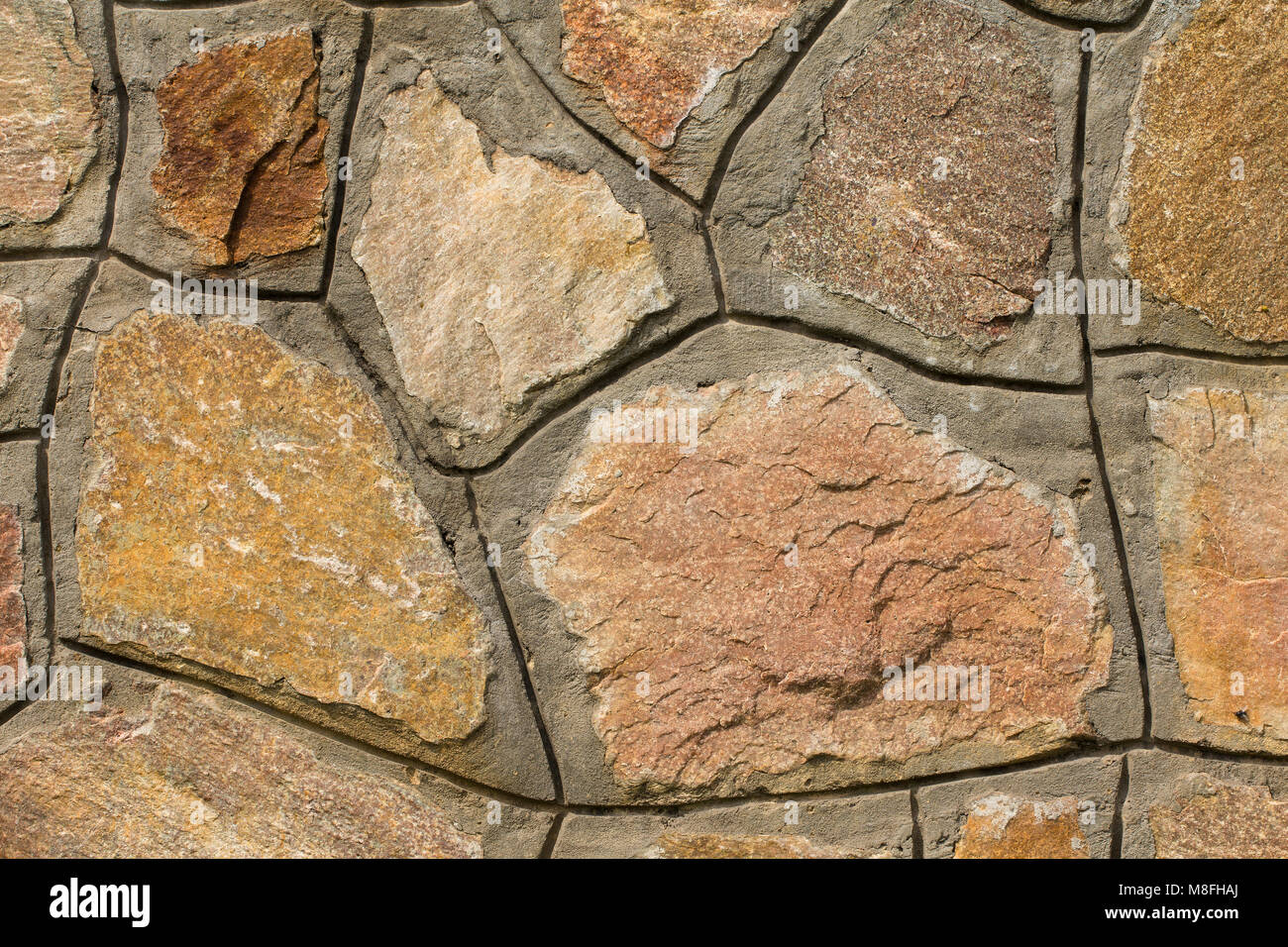 Horizontal stone wall of a nature rock - close up Stock Photo - Alamy