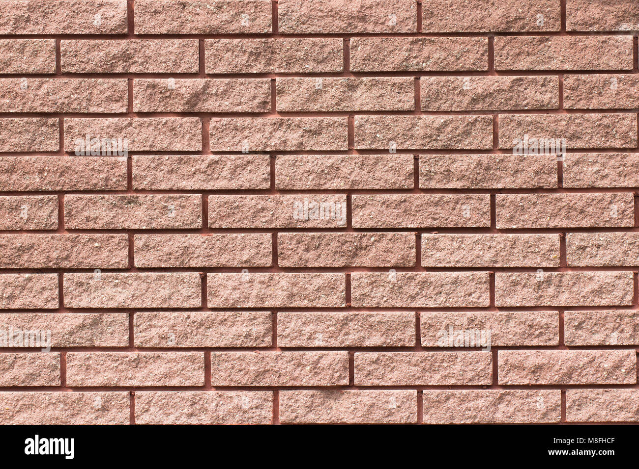 Stone wall of the rectangular bricks - close up Stock Photo - Alamy