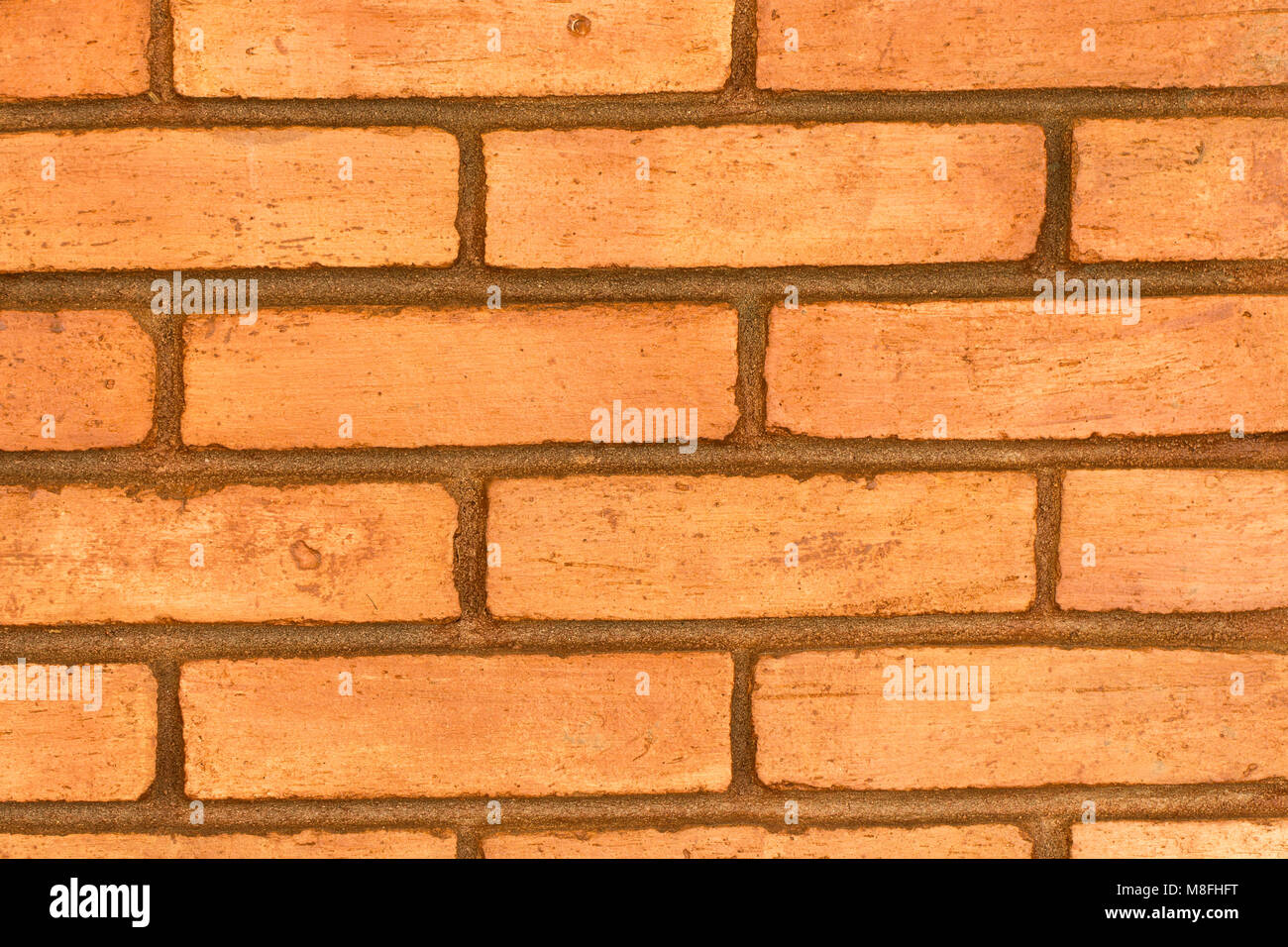 Stone wall of the rectangular bricks - close up Stock Photo - Alamy