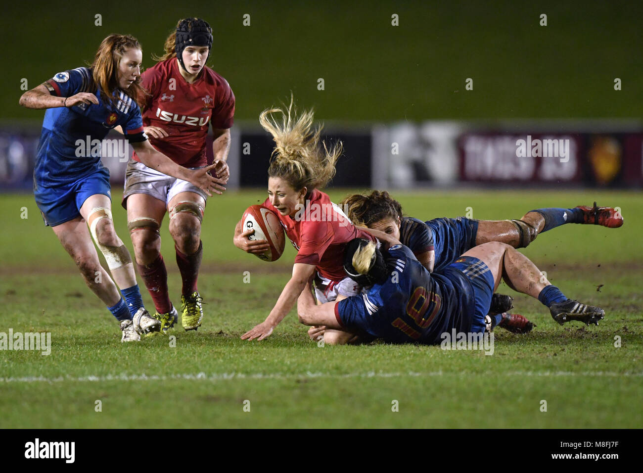 Wales' Elinor Snowsill is tackled by France's Patricia Caricaburu ...