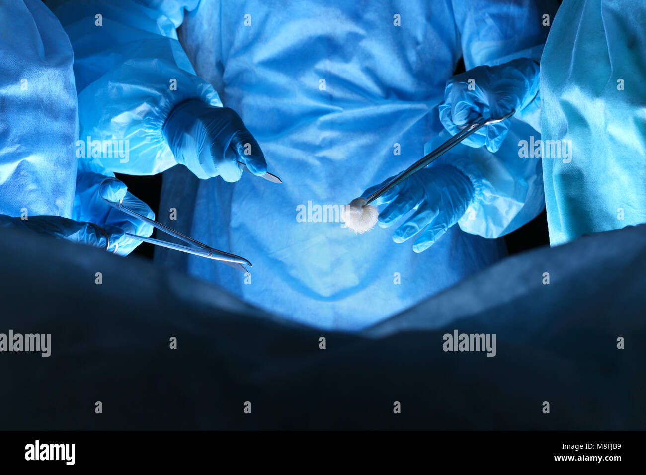 Doctor hands surgery hi-res stock photography and images - Alamy
