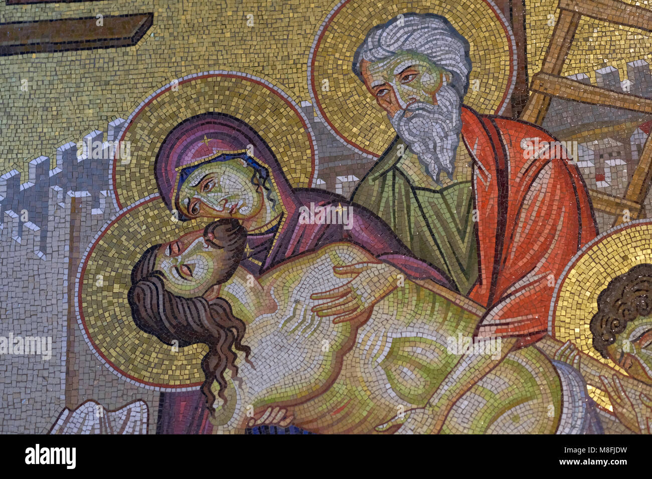 Excerpt from a wall mosaic depicting Jesus Christ's body being prepared ...