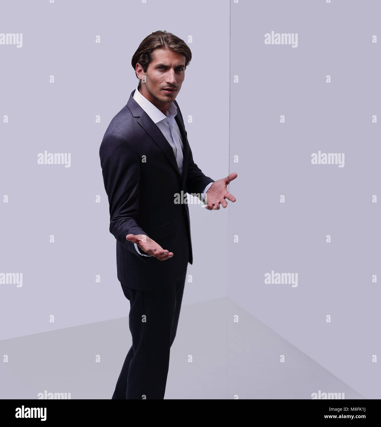 rear view.puzzled businessman Stock Photo - Alamy