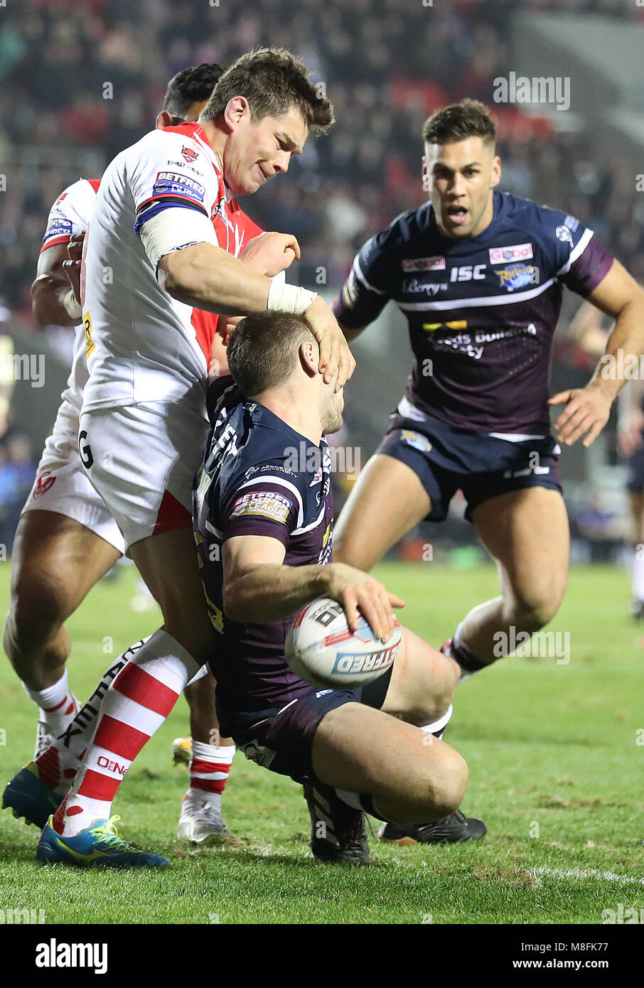 Leeds Rhinos Matt Parcell goes over for a try past St Helens' Louie ...