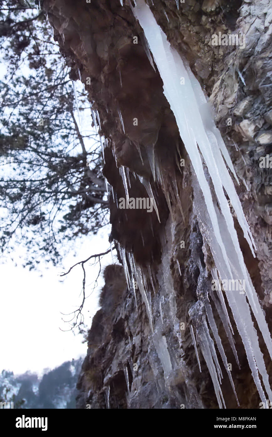 Ice Stalactite on Rock Stock Photo - Alamy
