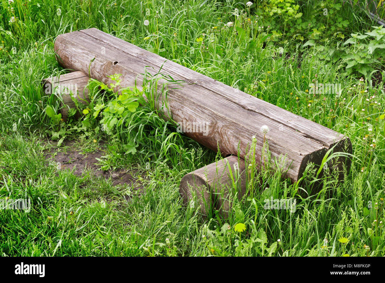 Primitive log bench hi-res stock photography and images - Alamy