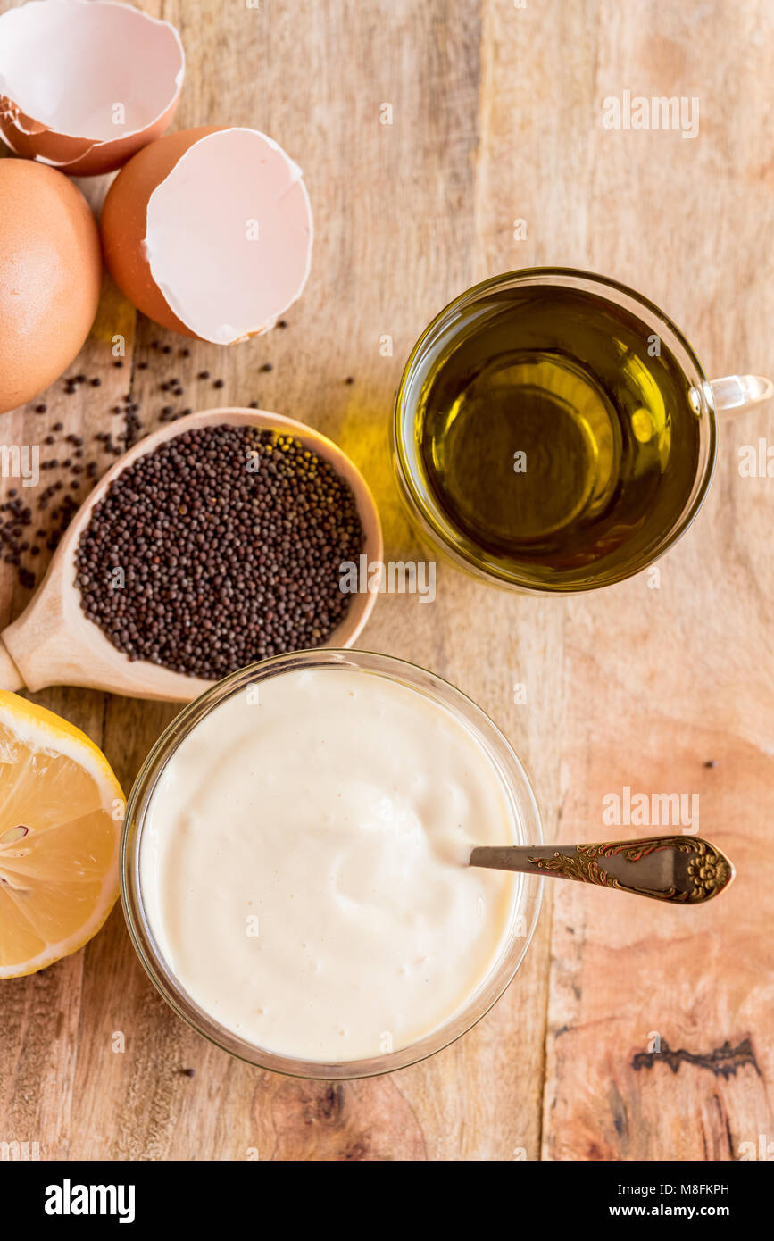 Homemade recipe Mayo (Mayonnaise) ingredients on wooden table rustic ...