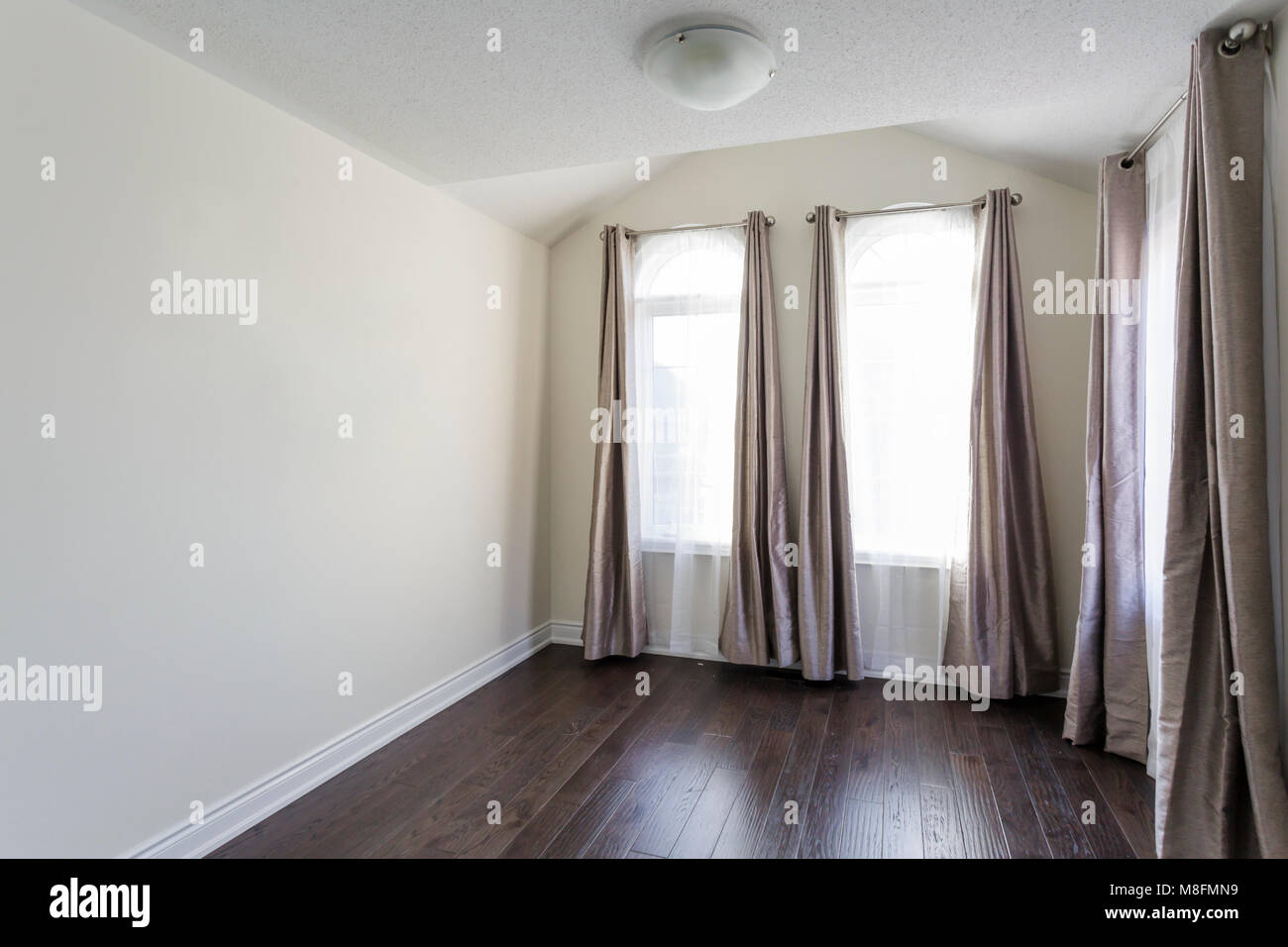 Empty living room interior design in a new house Stock Photo - Alamy