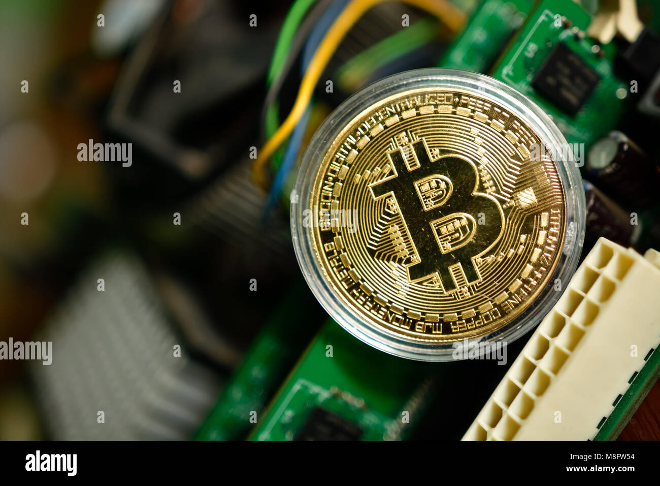 Close up of virtual currency bitcoin on computer motherboard Stock ...