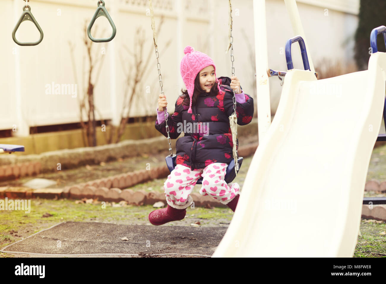 Kids playing outdoors in winter Stock Photo - Alamy