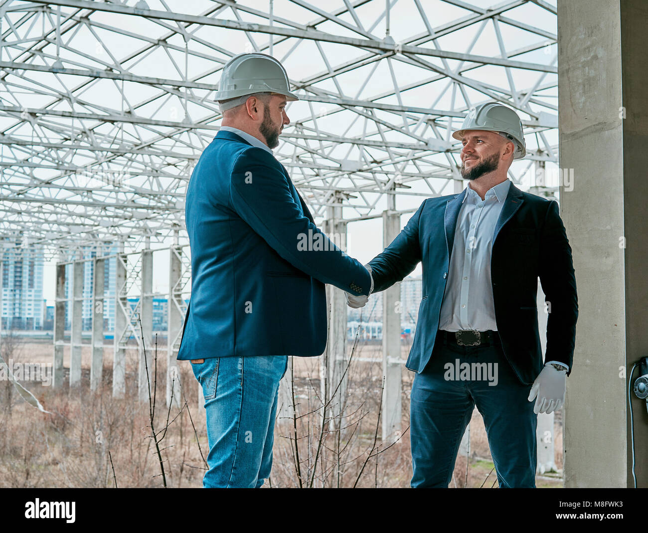 Male teamwork hi-res stock photography and images - Alamy