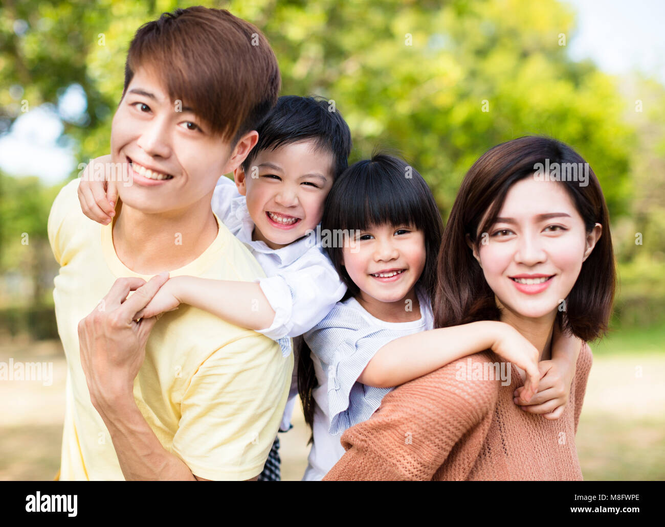 Portrait Of Happy asian Family In the park Stock Photo - Alamy