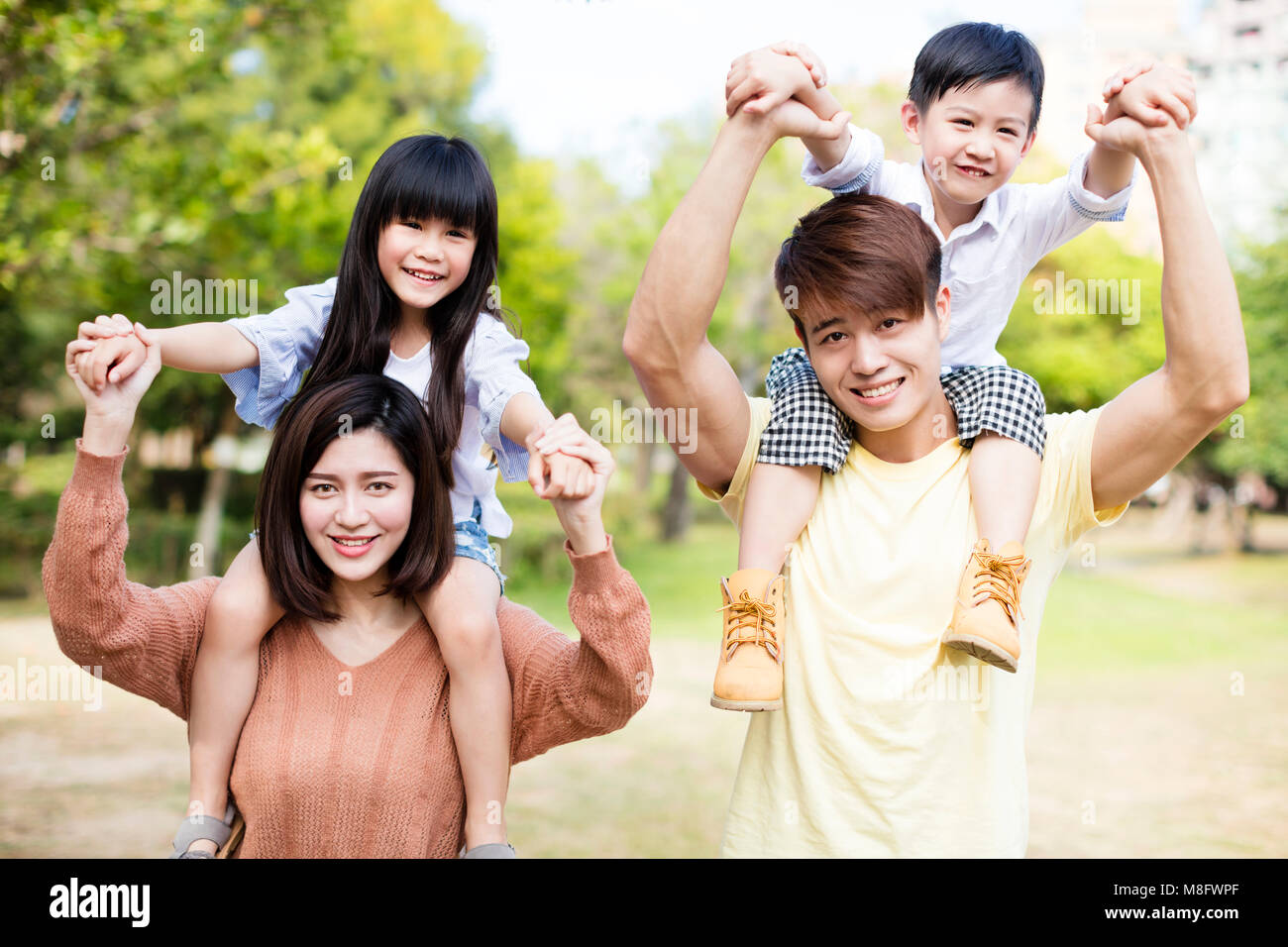Portrait Of Happy asian Family In the park Stock Photo - Alamy