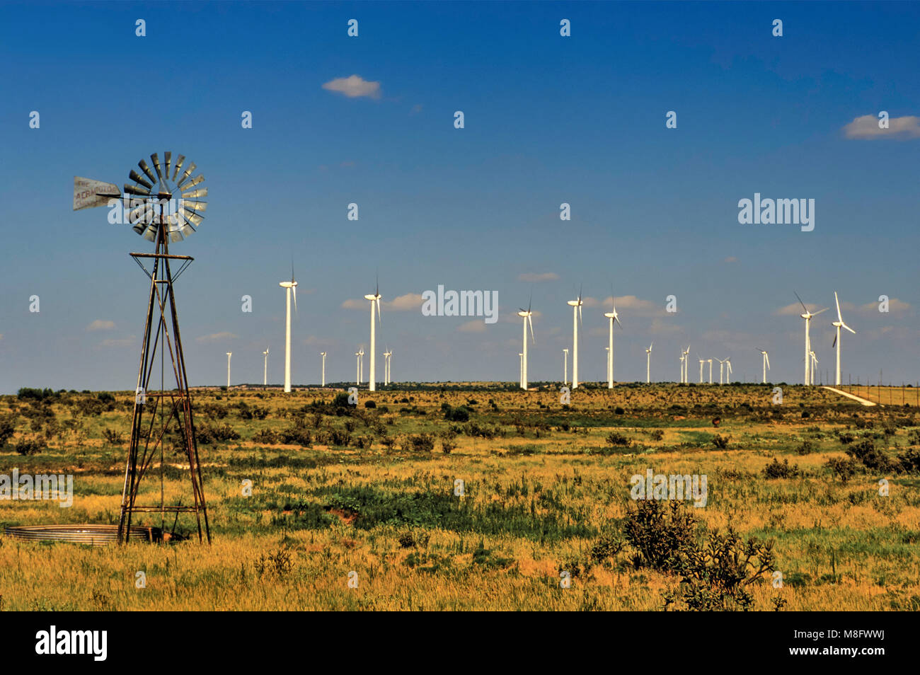 Wind powered water pump and wind turbines at ranch on Caprock ...