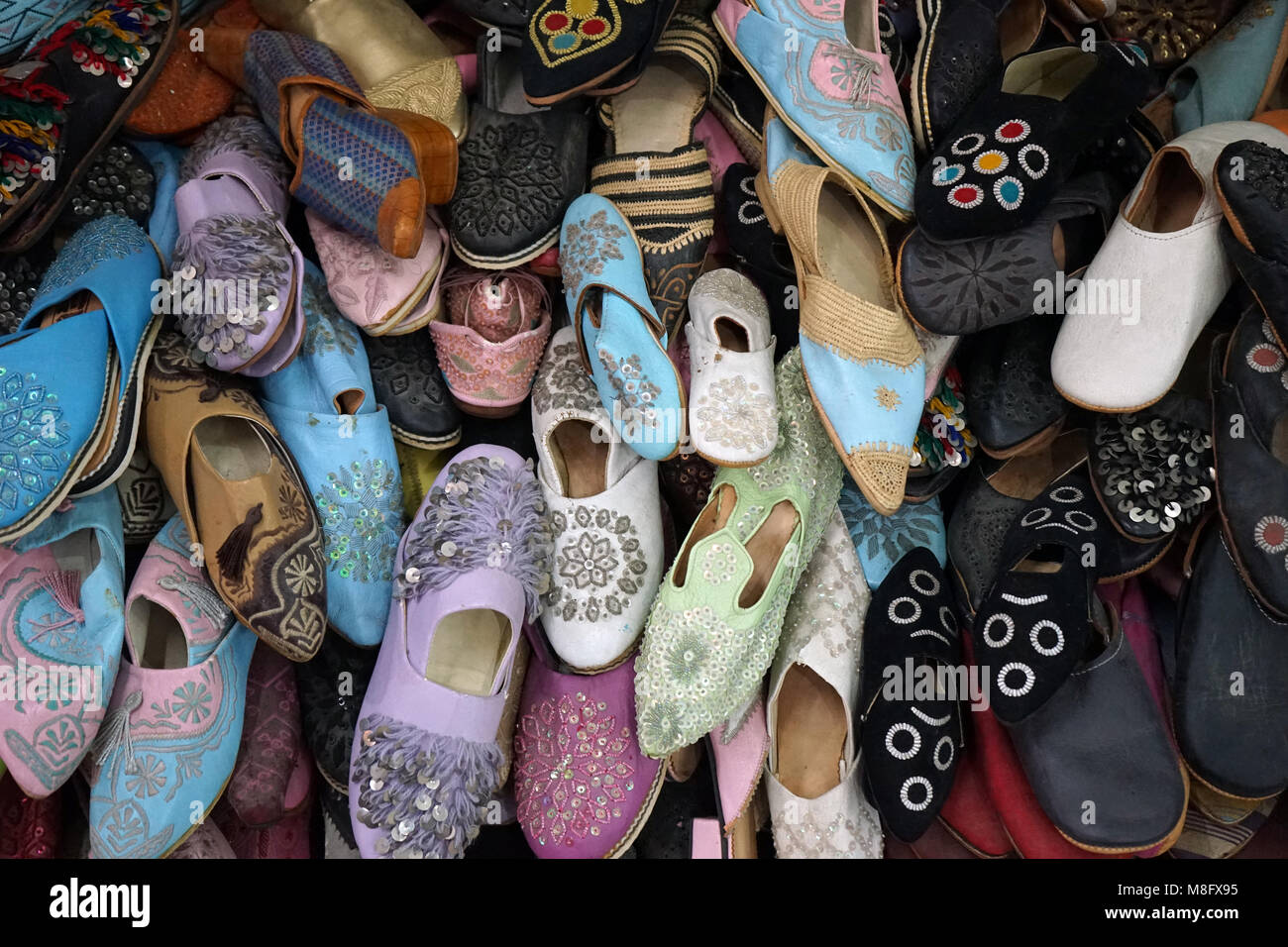 A lot of slipers on the shelf Stock Photo - Alamy