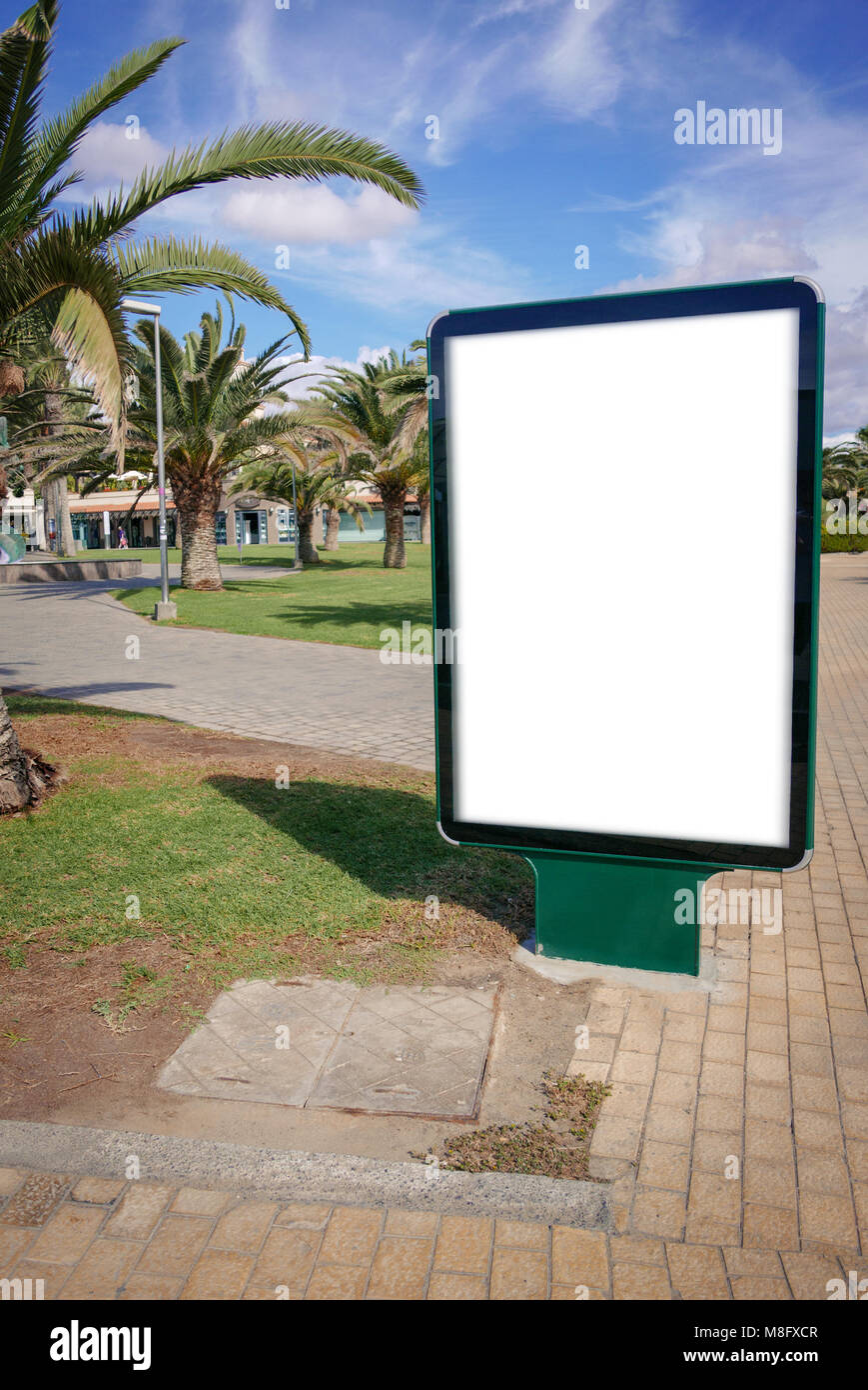 Vertical empty billboard staying on tropical island with palm trees ...