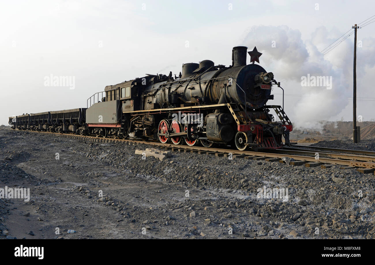 Empty train heads back to the mine at Fuxin. The coal mine system at ...