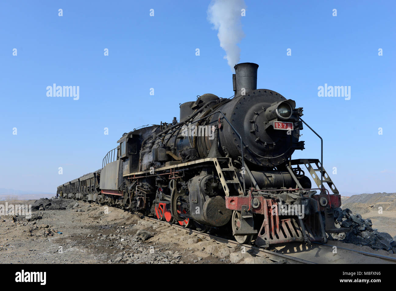 Loaded spoil train at the tip in Fuxin. The coal mine system at Fuxin ...