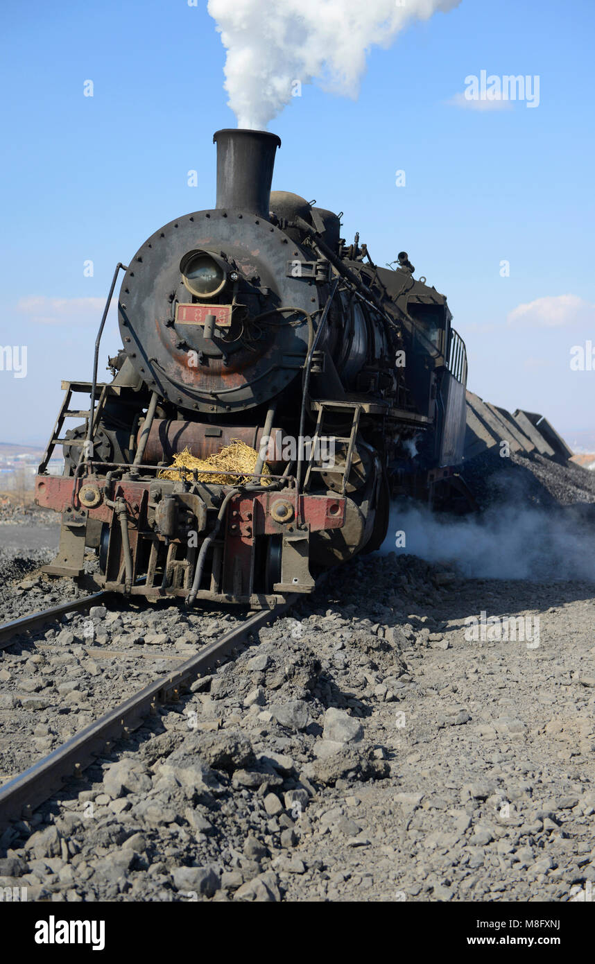 Unloading a spoil train at the tip in Fuxin. The coal mine system at ...
