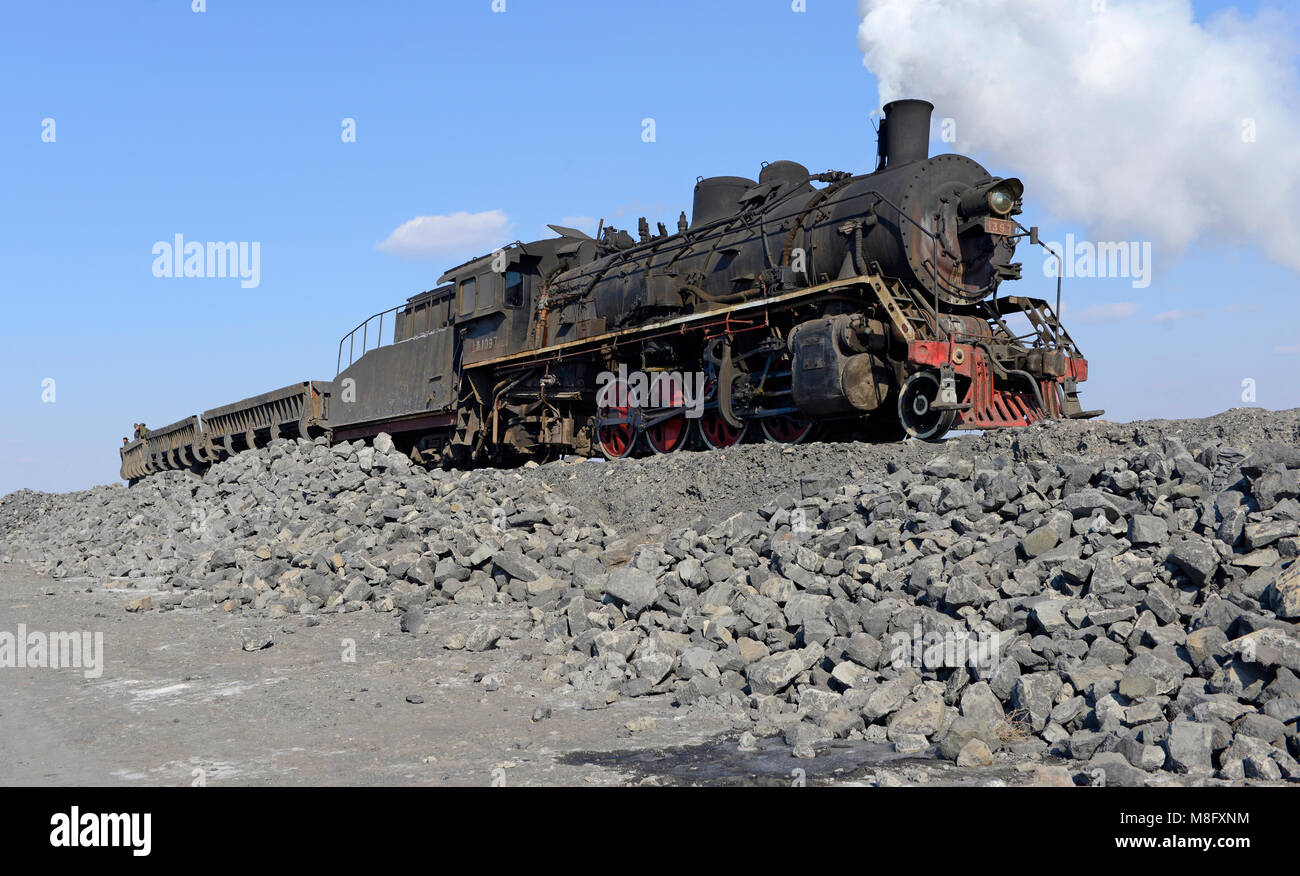 Unloading a spoil train at the tip in Fuxin. The coal mine system at ...