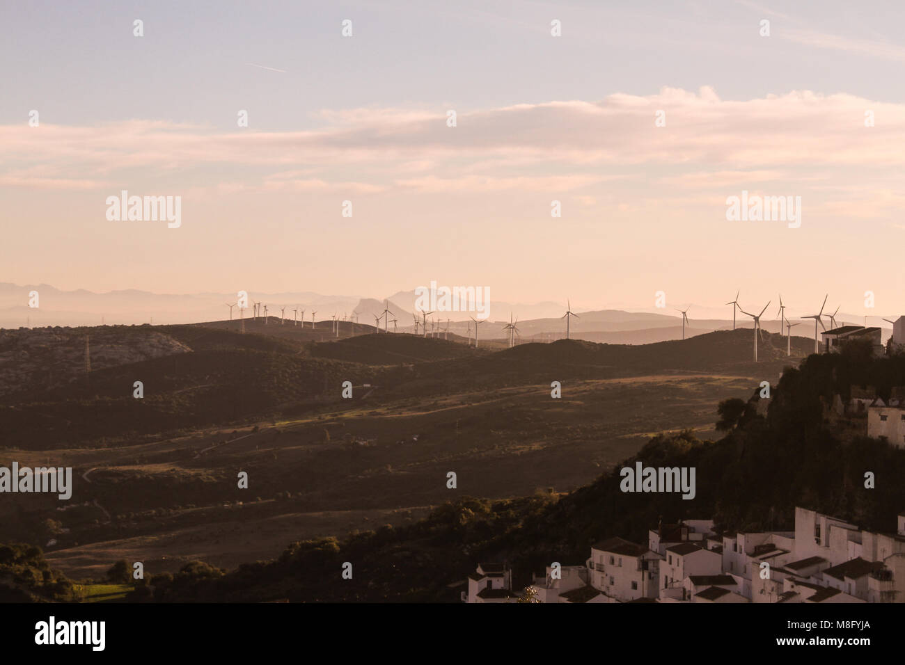 Natural mountain scenery with windmills generating electricity Stock ...