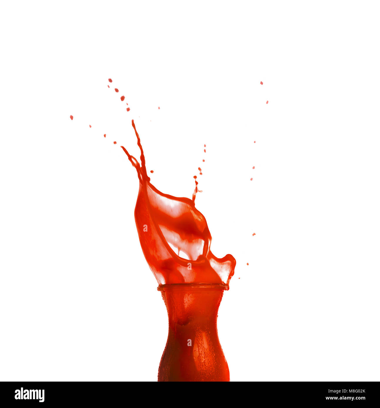 Bottle with red splash summer beverage: smoothie or juice , isolated on ...