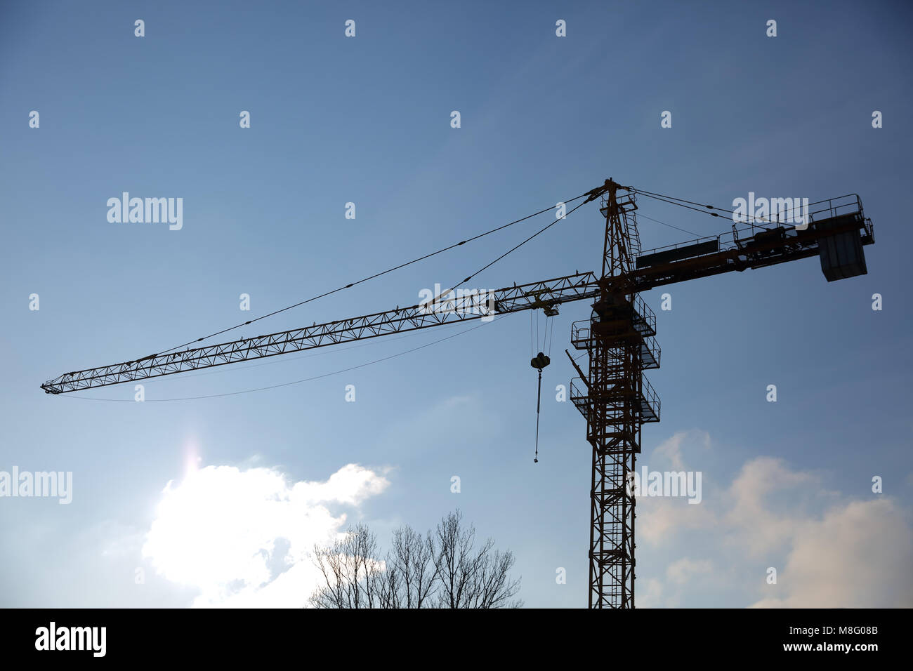 The construction crane is a basic tool when building at high buildings ...