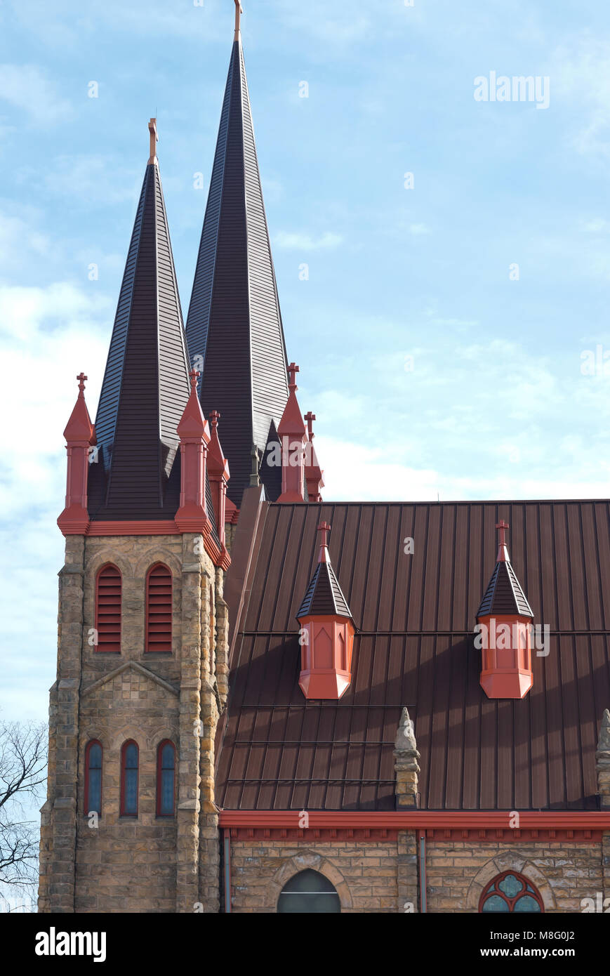 twin towers and steeples of romanesque revival style church exterior ...