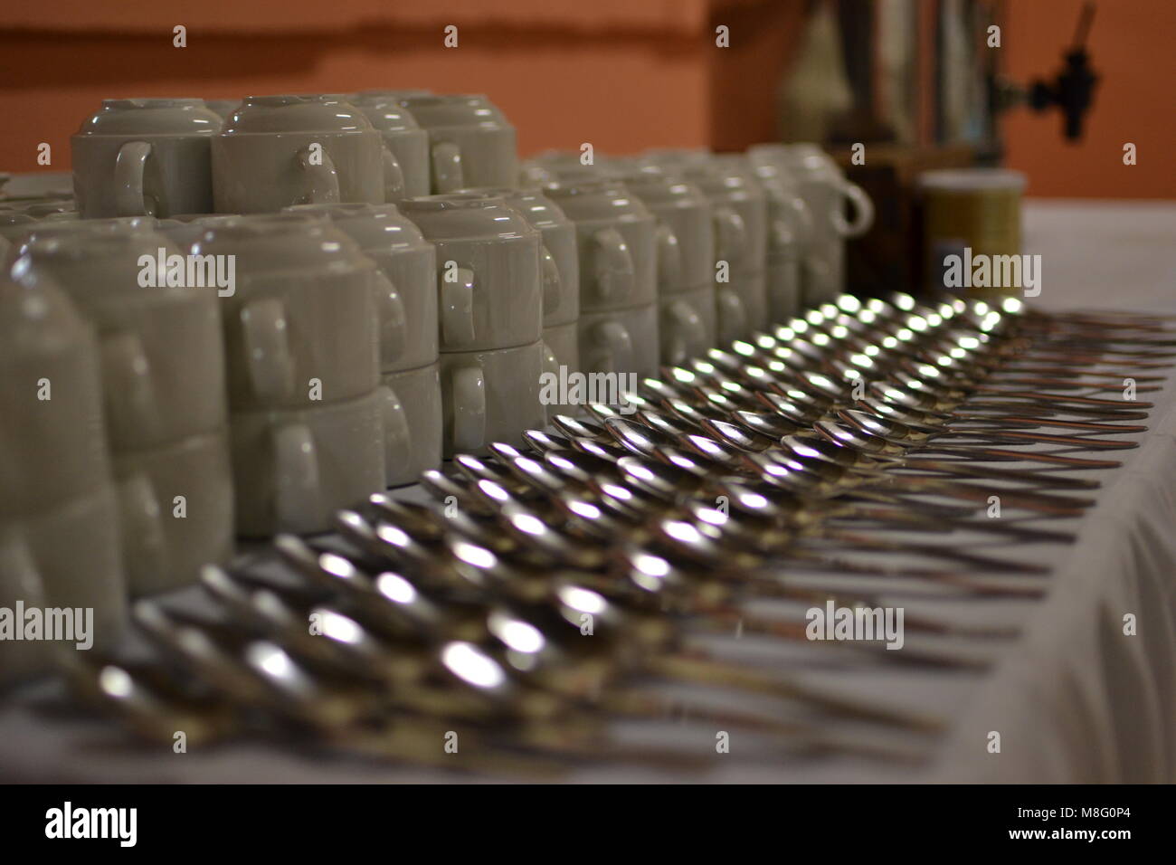 Catering - Cutlery and Crockery at Tea / Coffee Station Stock Photo - Alamy