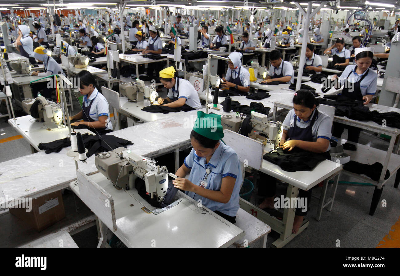 Sukoharjo, Indonesia. 15th Mar, 2018. Worker sewing fashion product on ...