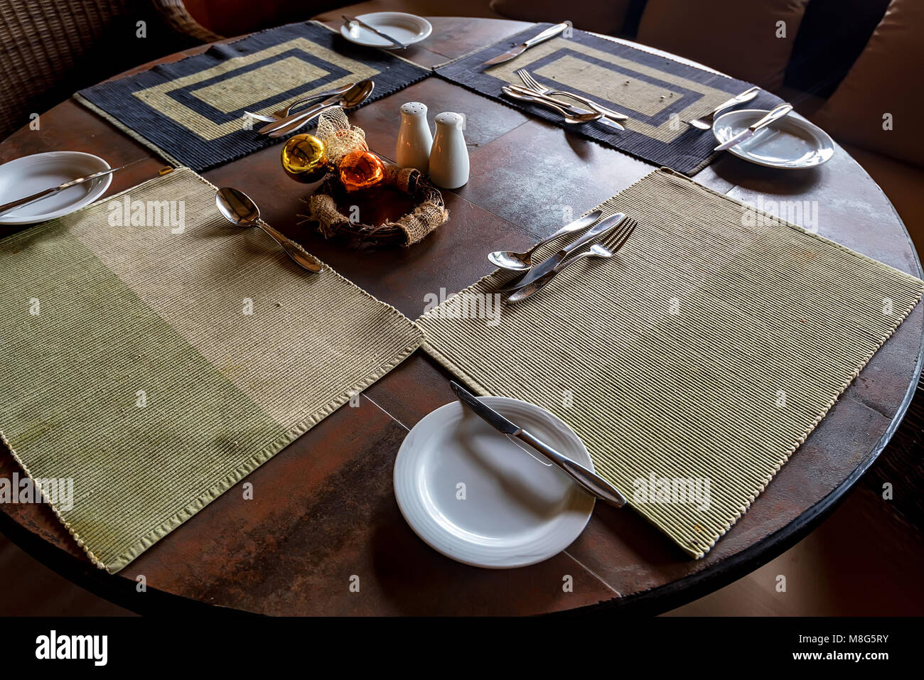 Round wooden restaurant table served for dinner Stock Photo - Alamy