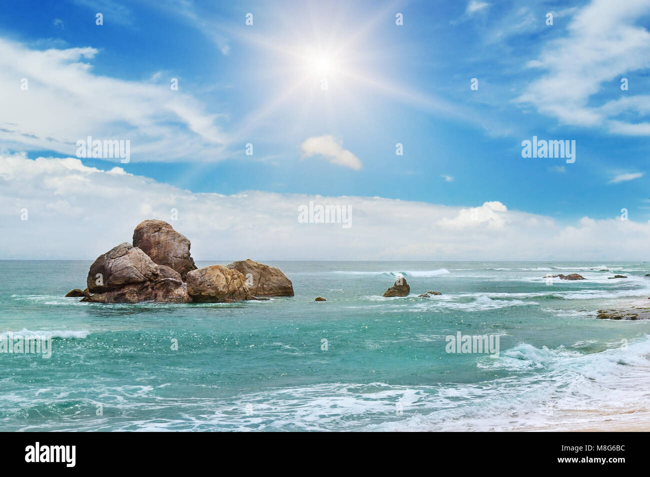 ocean, picturesque beach and blue sky Stock Photo - Alamy